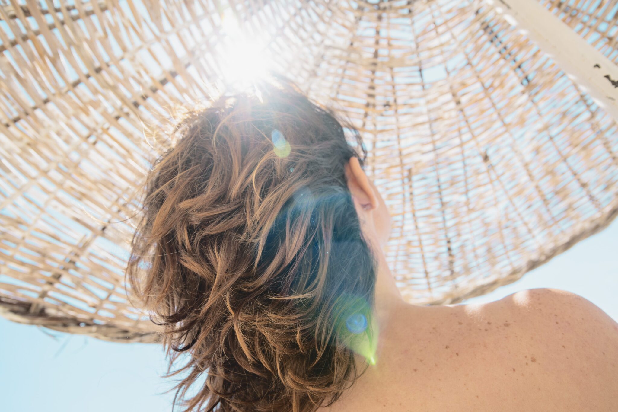Why does the sun lighten hair? The process of photo-oxidation of melanin