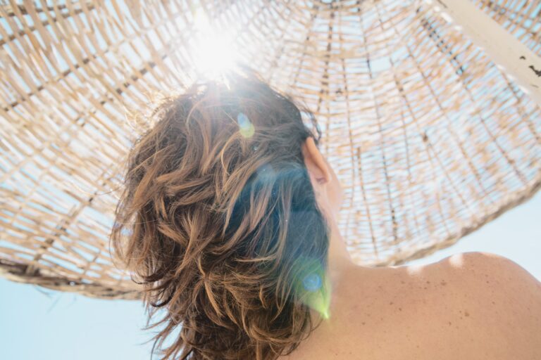 Why does the sun lighten hair? The process of photo-oxidation of melanin