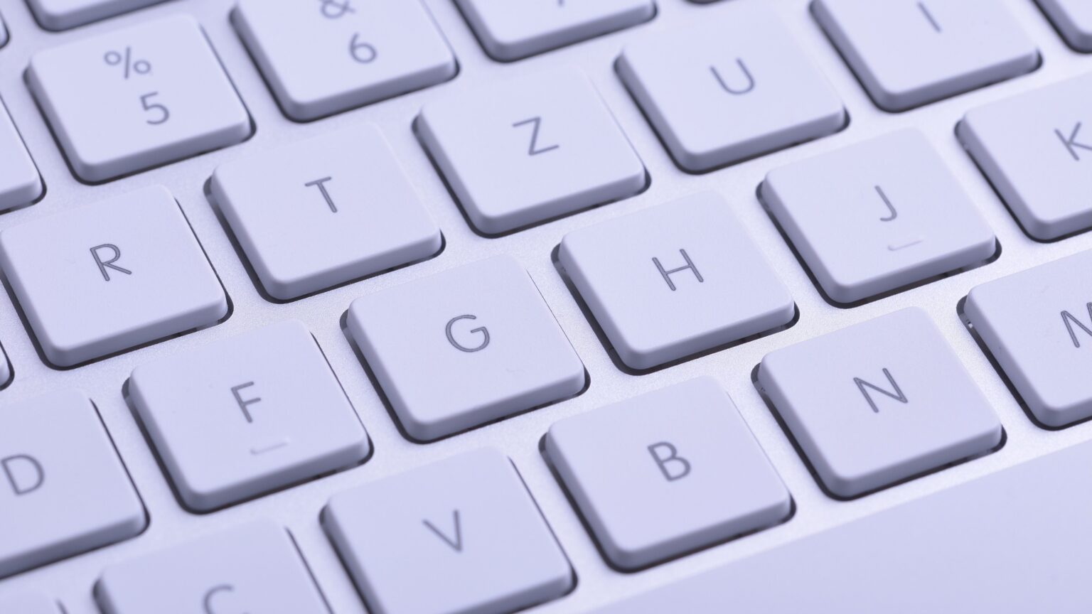 There are raised dashes on the “F” and “J” of the keyboard: that's what ...